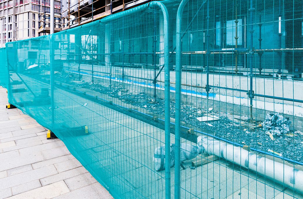 Securing Construction Sites with Block and Panel Fencing - Mobile Fence Inc